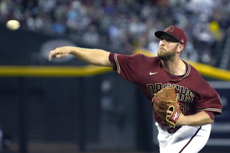 Cardinals beat Diamondbacks 6-4 for seventh straight win