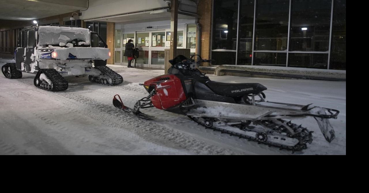 B.C. conservation officers on snowmobiles rescue man stuck in snowstorm