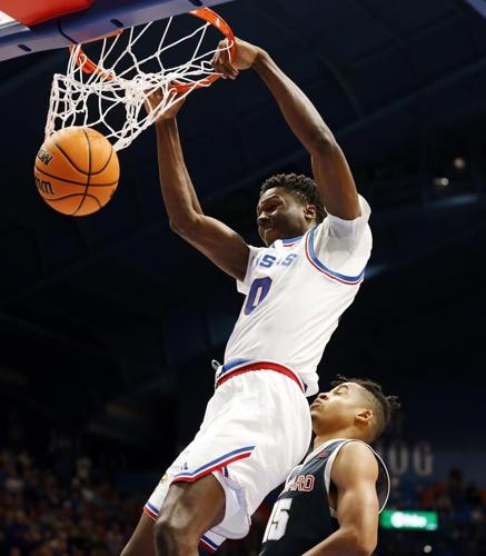 Mayo scores 19 as No. 1 Kansas beats Howard 87-57 in season-opener