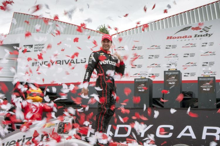 Will Power wins third Toronto Indy, with a little luck