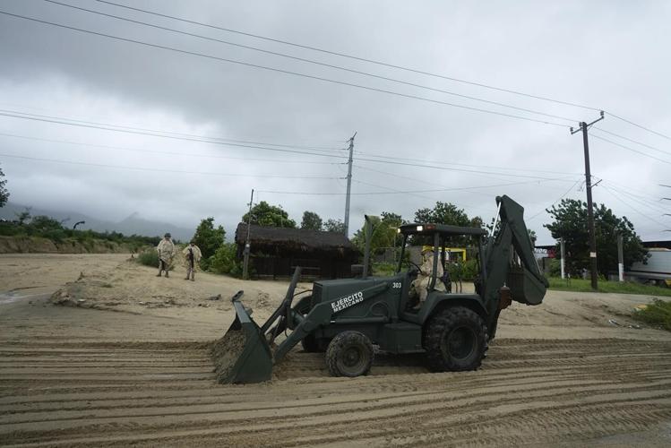 Hurricane Norma makes landfall near Mexico's Los Cabos and Tammy hits ...