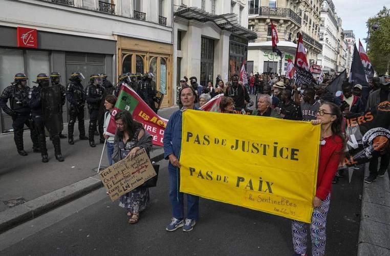 French activists protest racism and police brutality while officers are ...