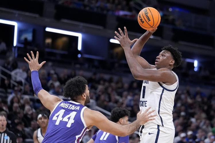 Johnson, Martinez help Utah State beat TCU 88-72 and halt 10-game March ...