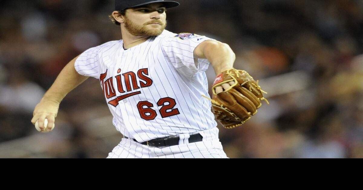 Blue Jays claim pitcher Liam Hendriks off waivers