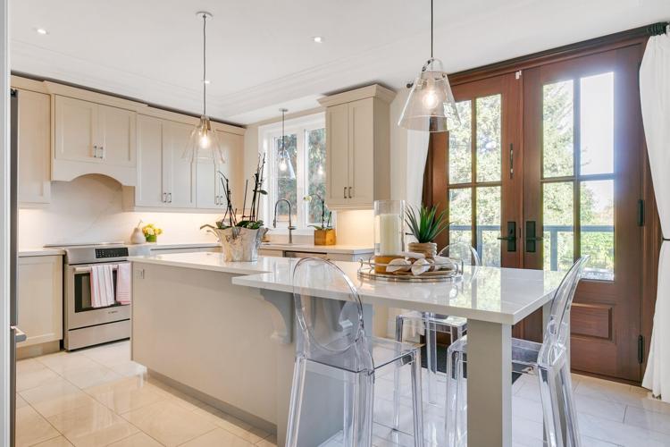 Roomy home in Guelph or custom-built house in Etobicoke?