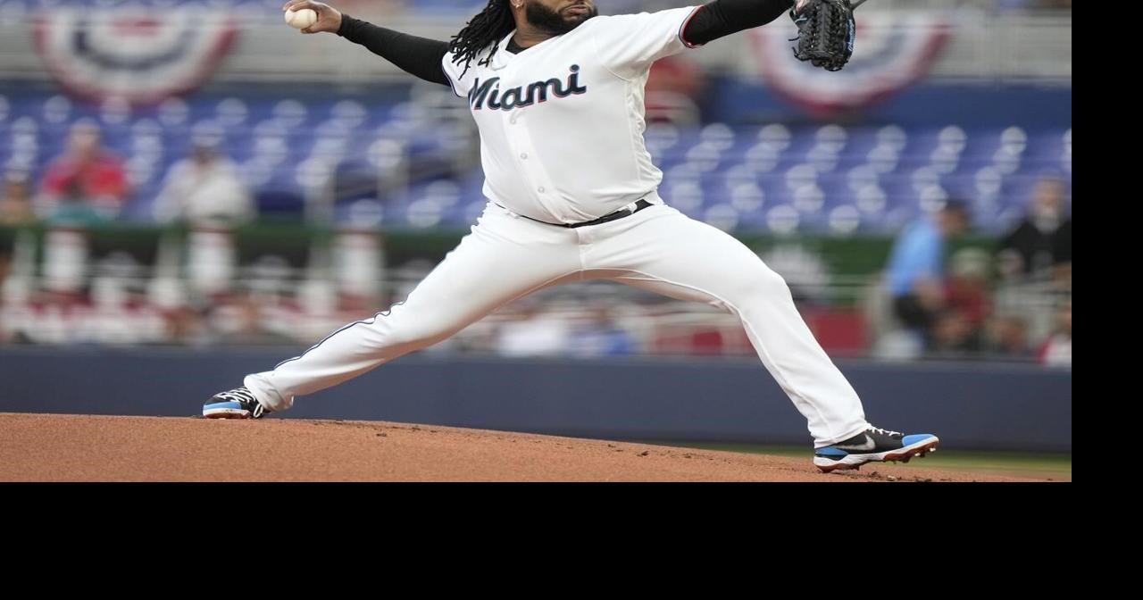 Cueto exits early with injury after rough Marlins debut