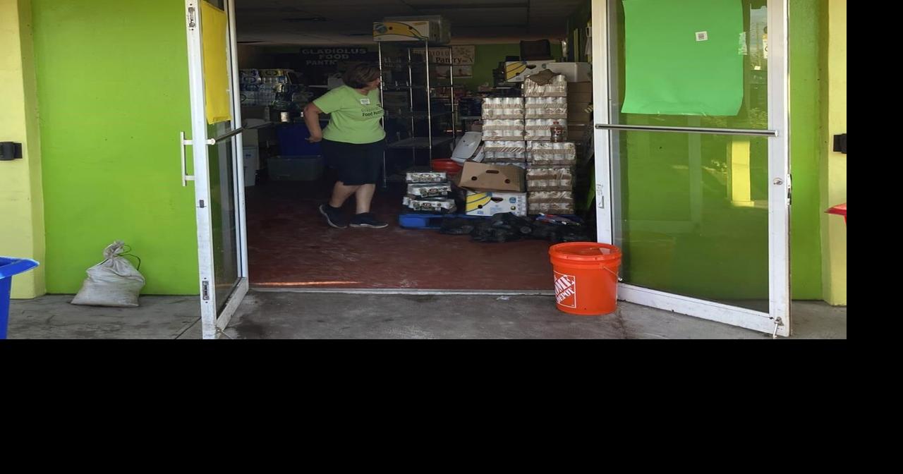 Poor Florida neighborhood battered by flood tries to recover