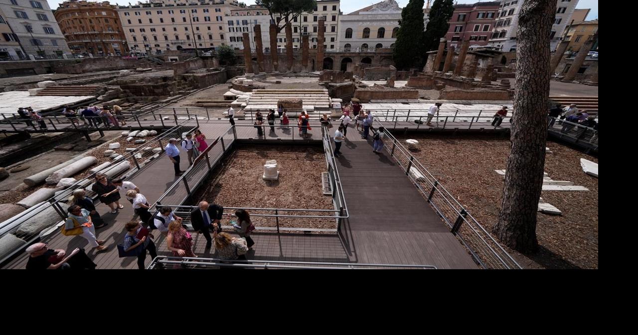 Ancient Roman temple complex, with ruins of building where Caesar was ...