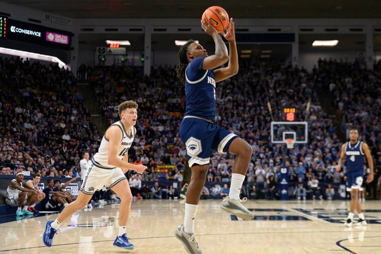 Mason Falslev scores 26 points to help No. 23 Utah State beat Nevada 71-62