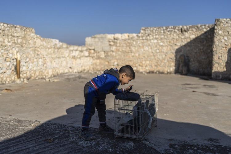 AP PHOTOS: In northern Syria, displaced owners return to houses with no ...