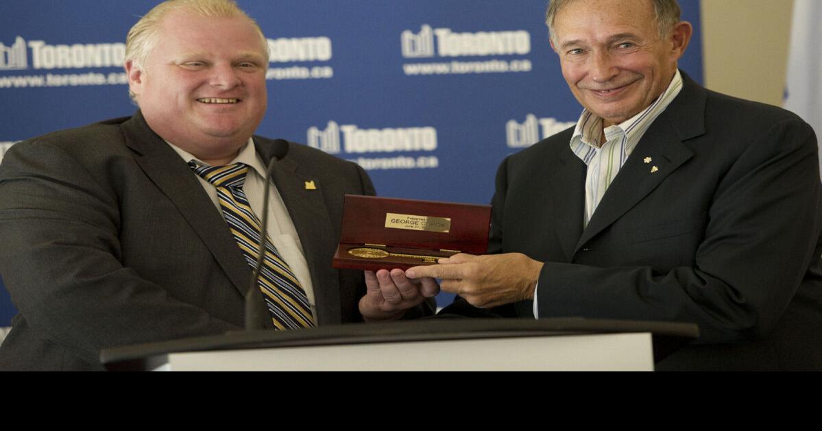 Mayor Rob Ford gives McDonald’s Canada founder George Cohon key to the city