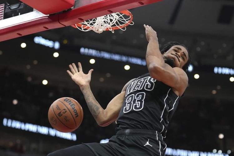 Giddey gets a triple-double as the Bulls race past the Nets for a 128 ...