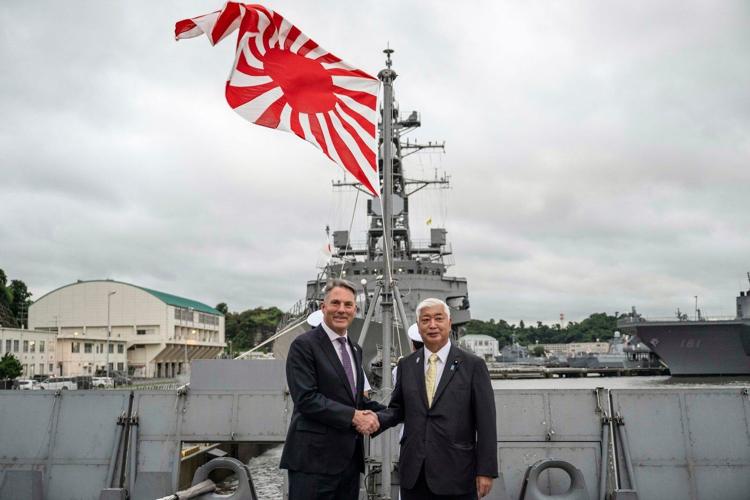 Australia's defense minister visits a frigate in Japan as the countries ...