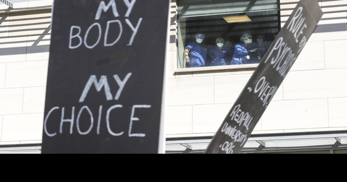 Front-line doctors fighting on two fronts: a deadly pandemic and ...