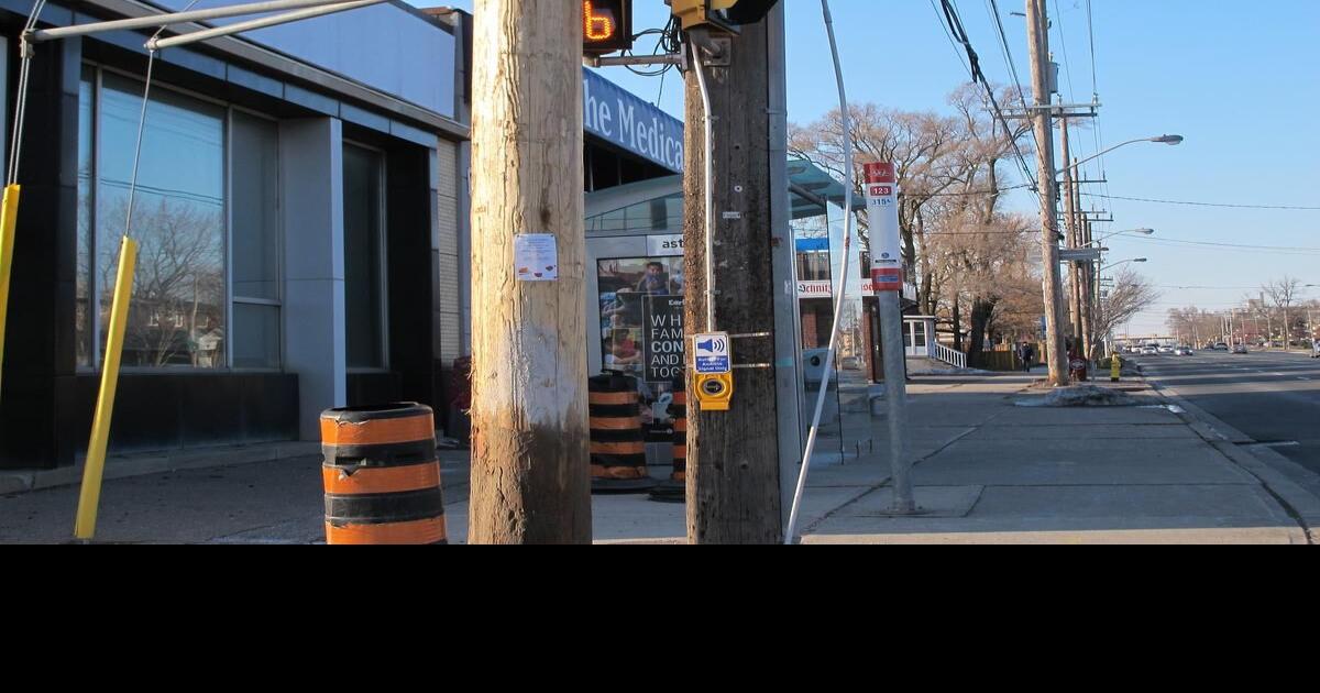New utility pole makes pedestrian crossing signal impossible to see
