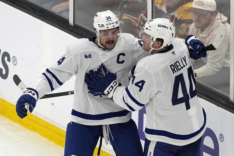 Marchand gets 1st goal of season in OT to lift Bruins to 4-3 win over ...