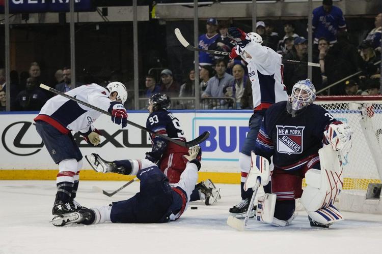 Ovechkin gets No. 885, Wilson scores in OT as Capitals beat Rangers 3-2