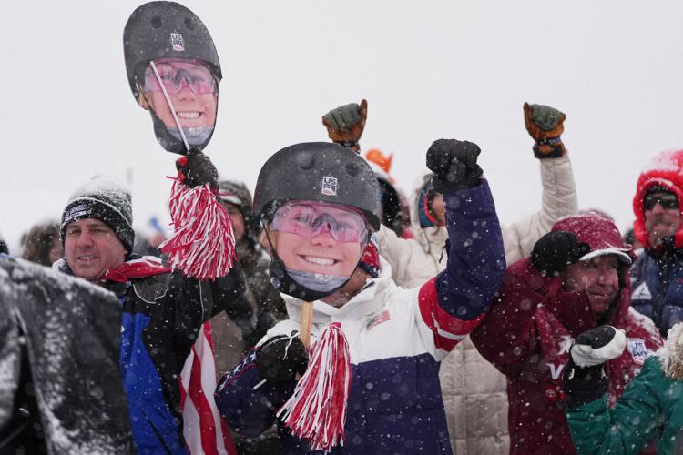 Athletes and fans brave the snow and cold at the Winter Games, in photos