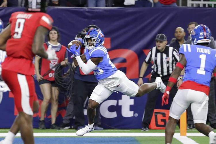 Shough leads Texas Tech over Ole Miss 42-25 in Texas Bowl