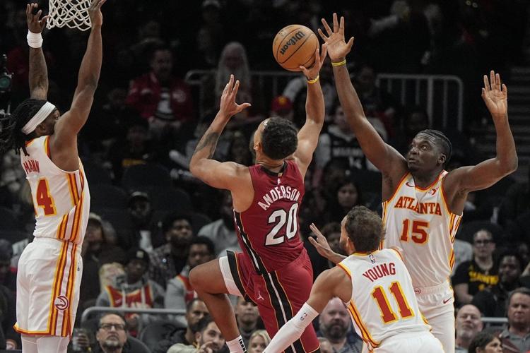 Hawks allow their fewest points in nearly 4 years, shut down Heat 98-86