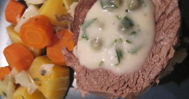 Boiled mutton with parsley-caper sauce