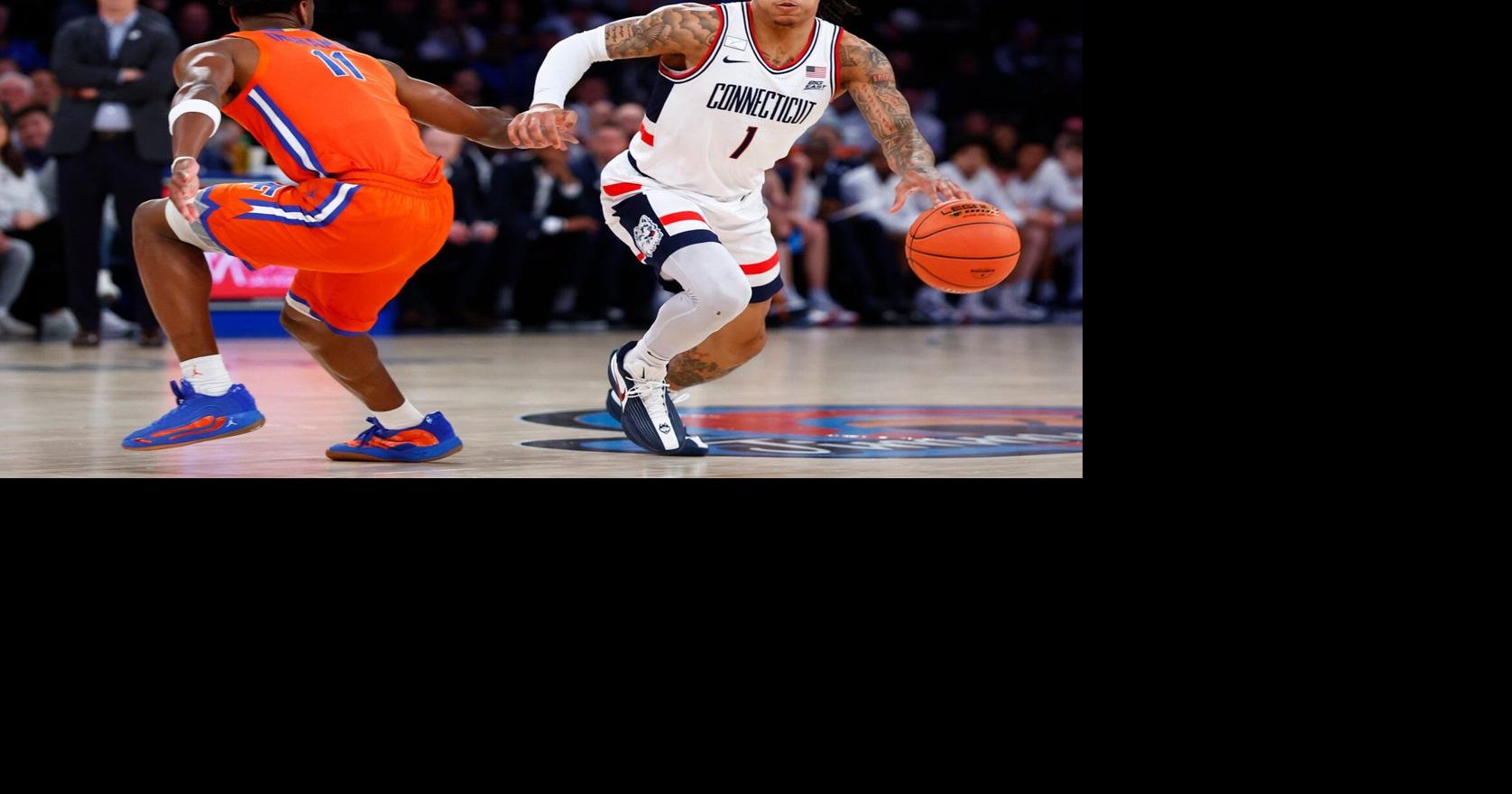 Ball scores 19 points as No. 5 UConn beats No. 18 Florida 77-73 in ...