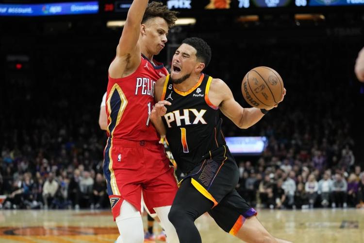 Round 2 between the Raptor mascot and Devin Booker is postponed
