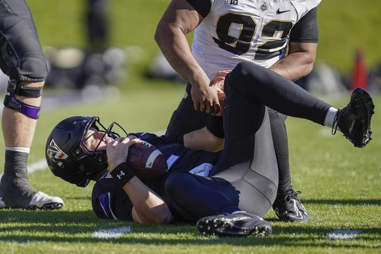 Porter scores two touchdowns and Northwestern beats Purdue 23-15