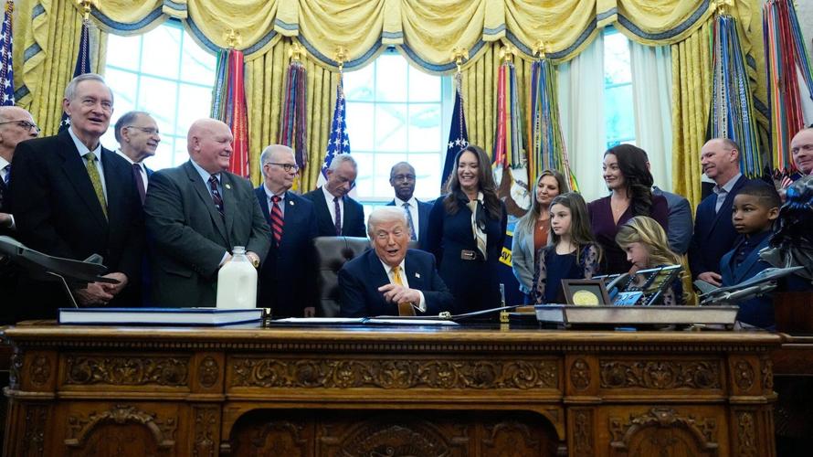 Milk gets a perch on Trump's desk but takes a back seat at bill signing