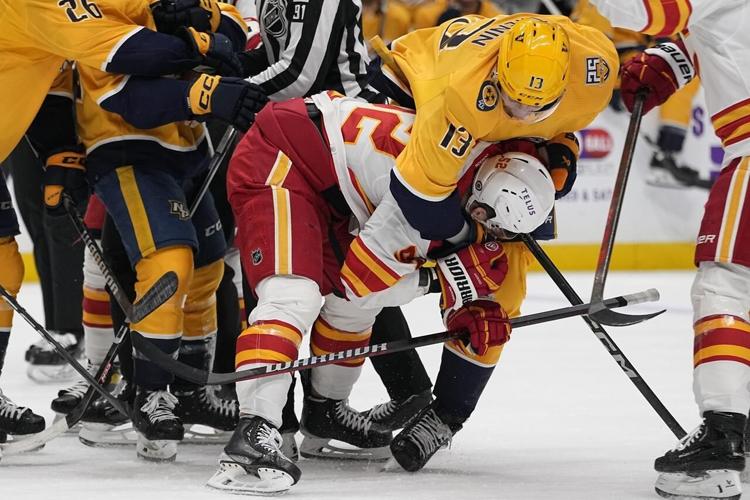 Flames score 4 goals in 1st, beat Predators 6-3 for 3rd straight win