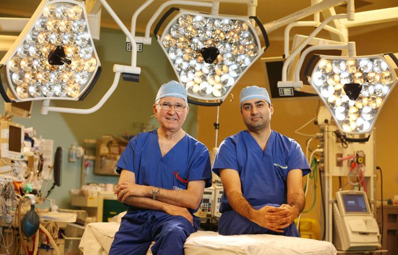 Heart surgeons, though different ages, share the same commitment