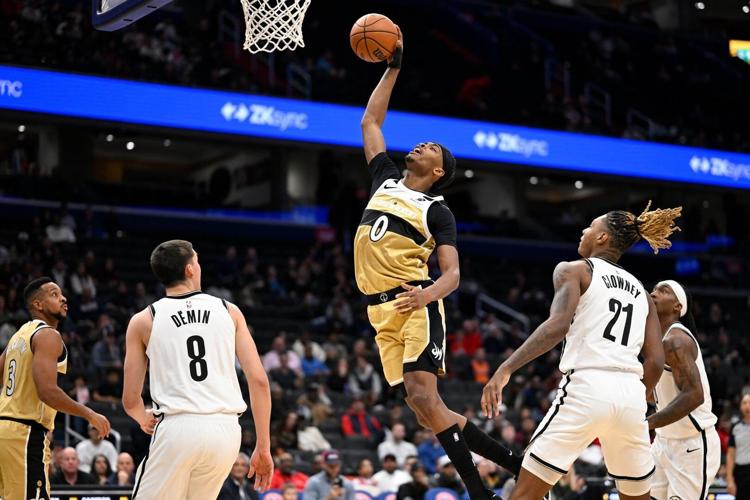 Nets beat Wizards 129-106 in a matchup of 1-win teams, sending ...