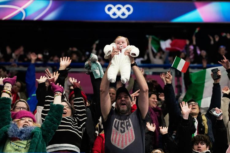 Fans from around the world fuel the Olympic spirit, in photos