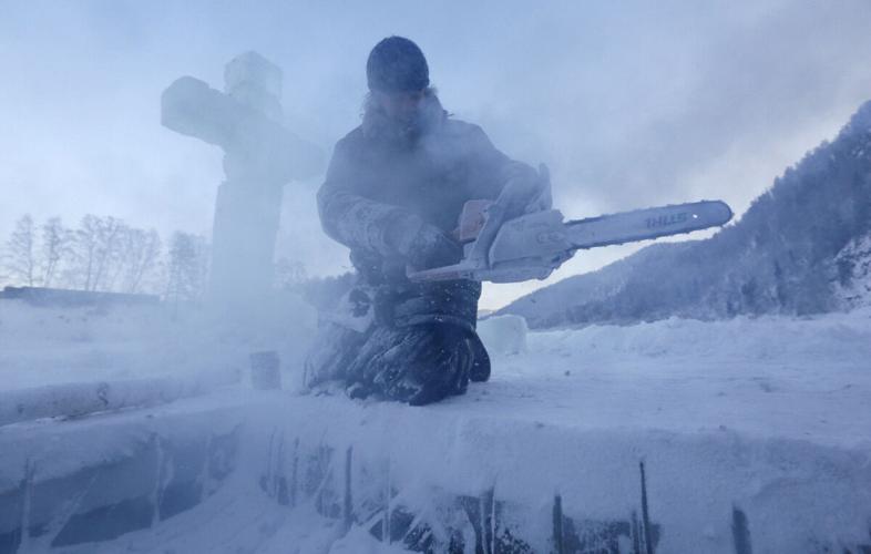 Thousands of Russians brave freezing waters to celebrate Epiphany