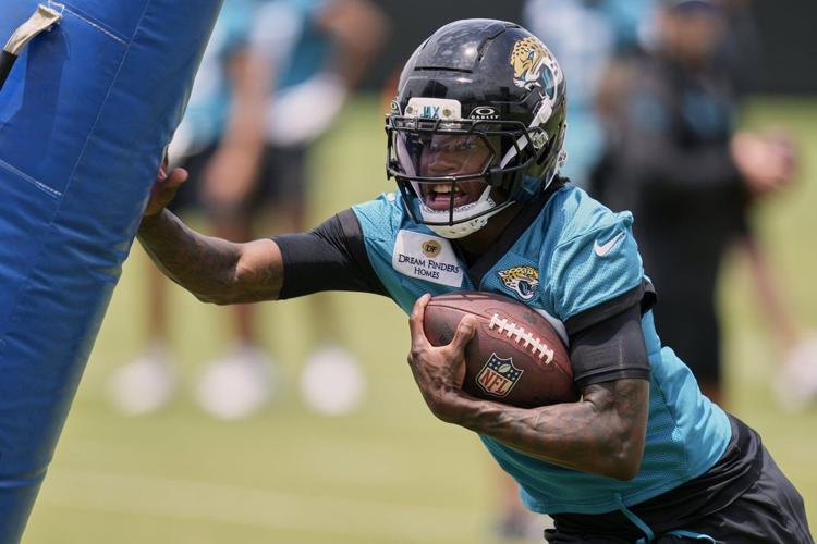Jaguars' Travis Hunter will move to defense after wowing fans on offense during rookie camp