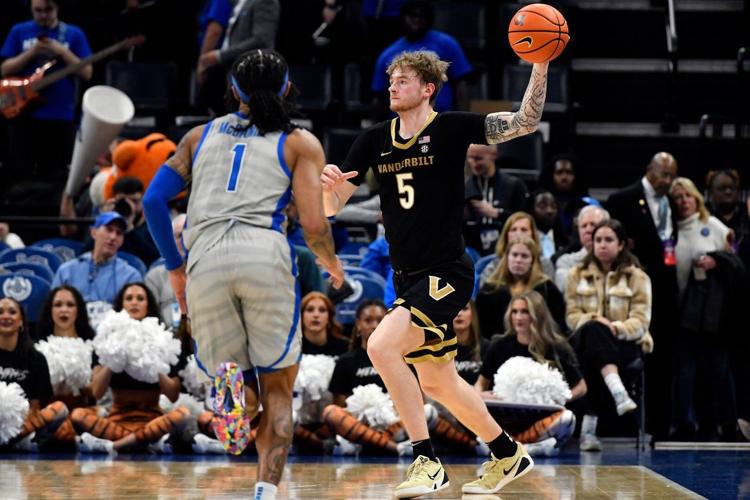Duke Miles scores 22 points as No. 13 Vanderbilt beats Memphis 77-70 in OT