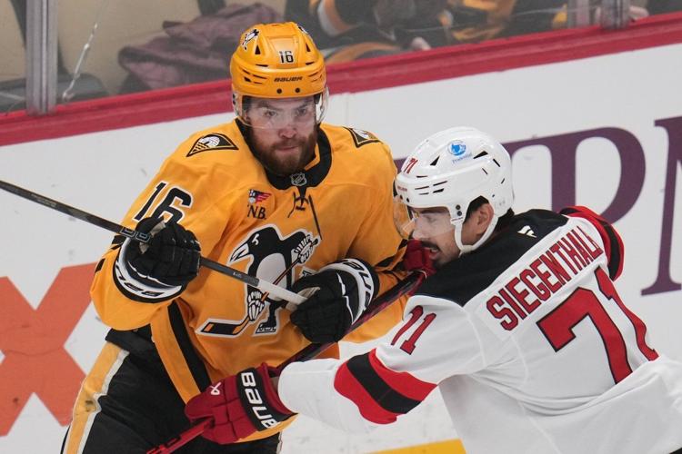 Late goals by Clifton and Chinakhov push the Penguins past Jack Hughes ...