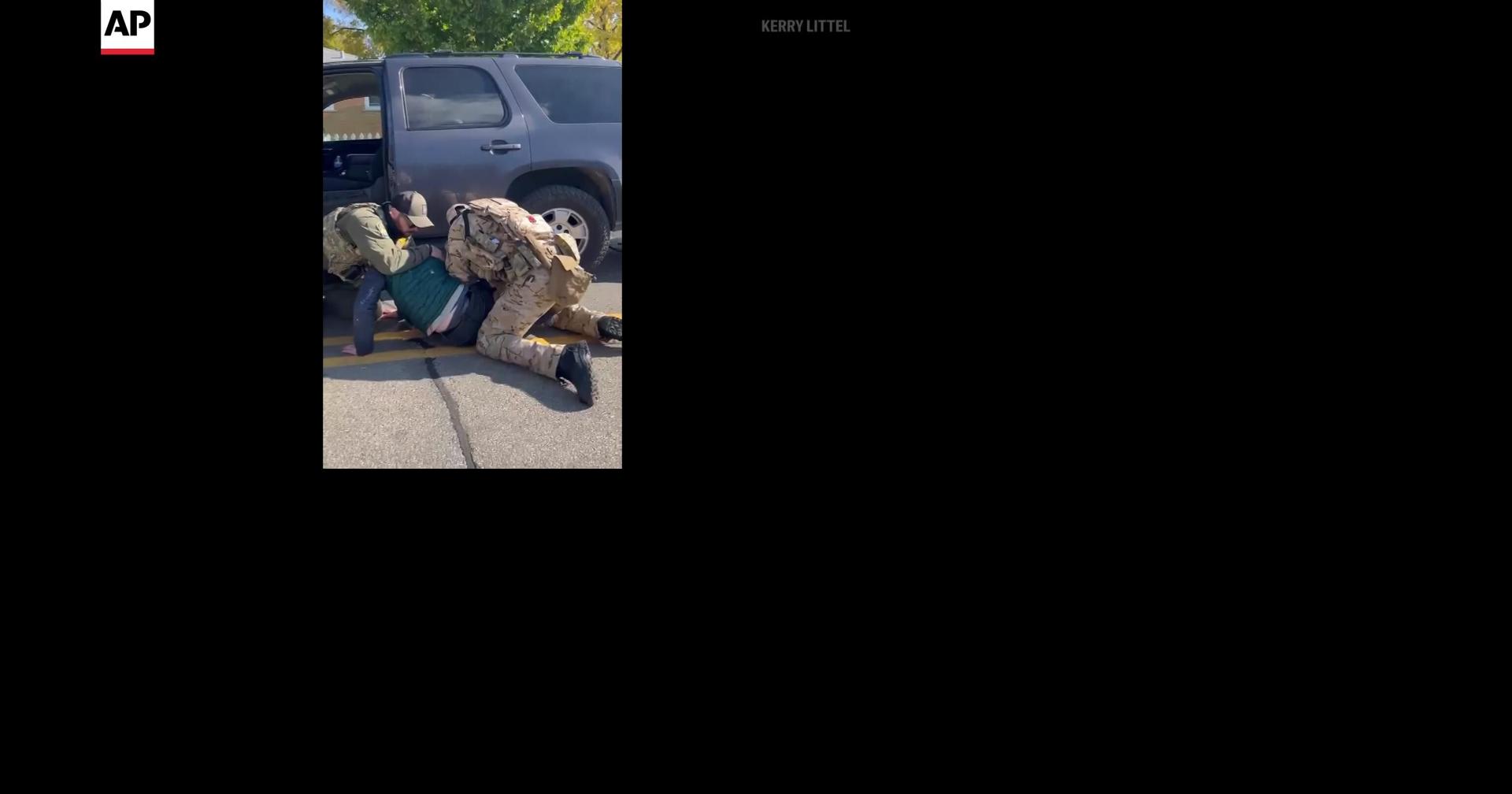 Video shows immigration agent punching restrained man after car ...