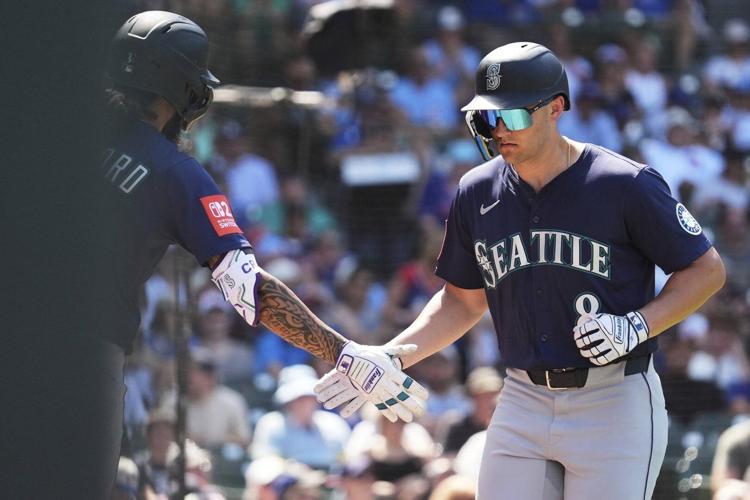 Donovan Solano hits 2 homers as the Seattle Mariners beat the Chicago ...