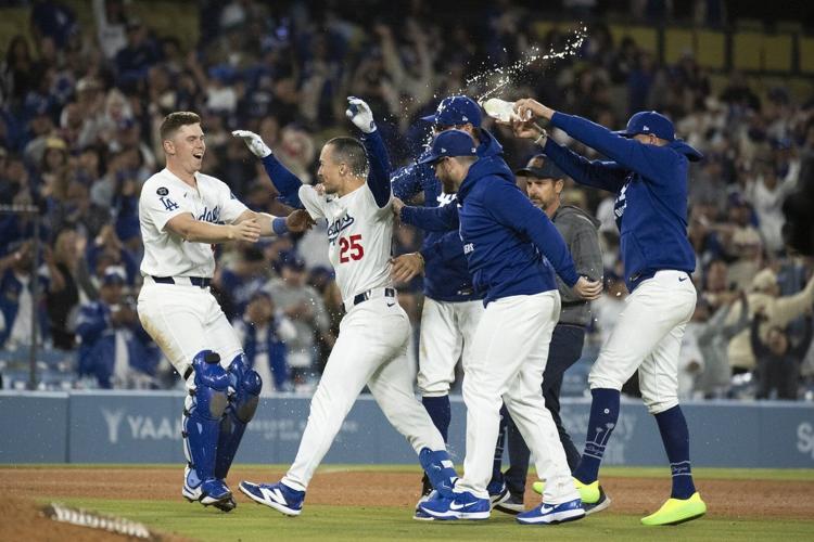 Edman delivers in 10th as Dodgers weather Myers' pinch-hit slam for 7-6 ...