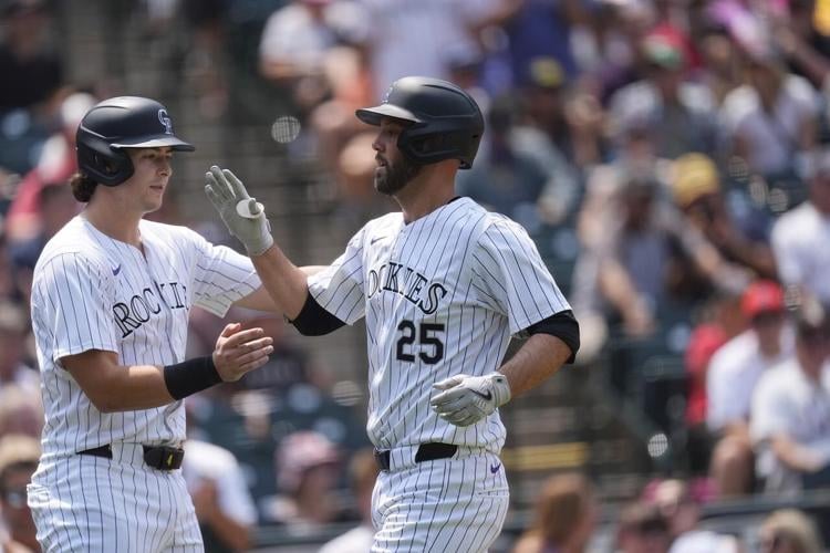 Doyle hits 1st career grand slam, Rockies tie franchise record for runs ...