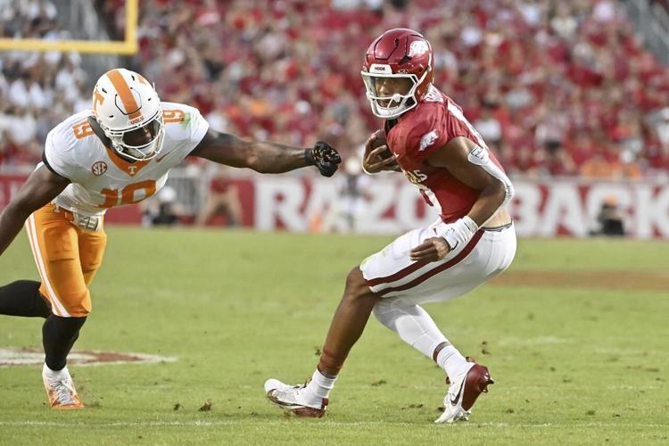 Singleton scores late TD as Arkansas beats No. 4 Tennessee 19-14