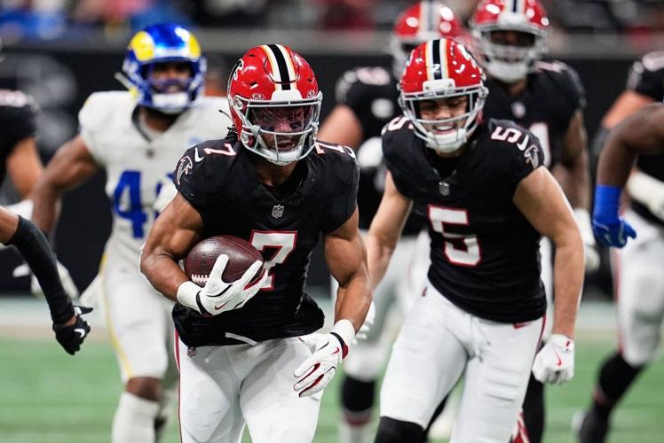 Robinson runs for 195 yards as Falcons recover to upset Rams 27-24 on ...