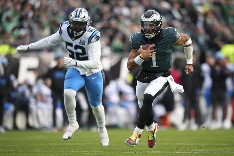Barkley's brilliance helps Eagles beat Panthers 22-16 but pass game has ...