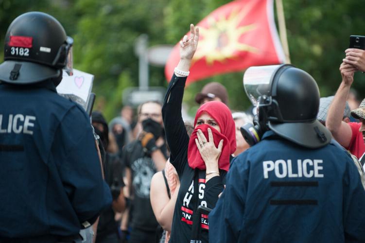 Rally in Quebec turns violent after protesters opposing anti-immigrant ...
