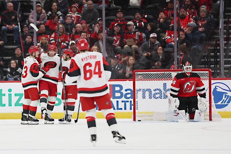 Hall has goal and assist as Hurricanes beat Devils 3-1 to snap 3-game ...