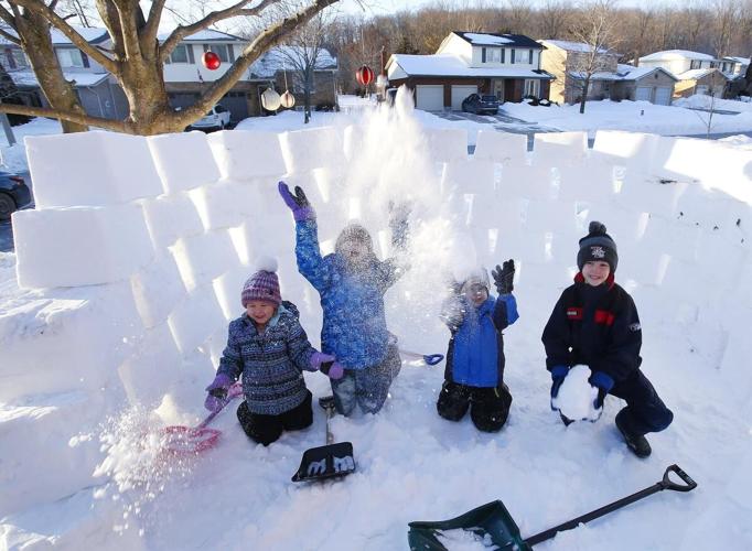 Photos: Siblings build giant snow fort in front of their Peterborough home