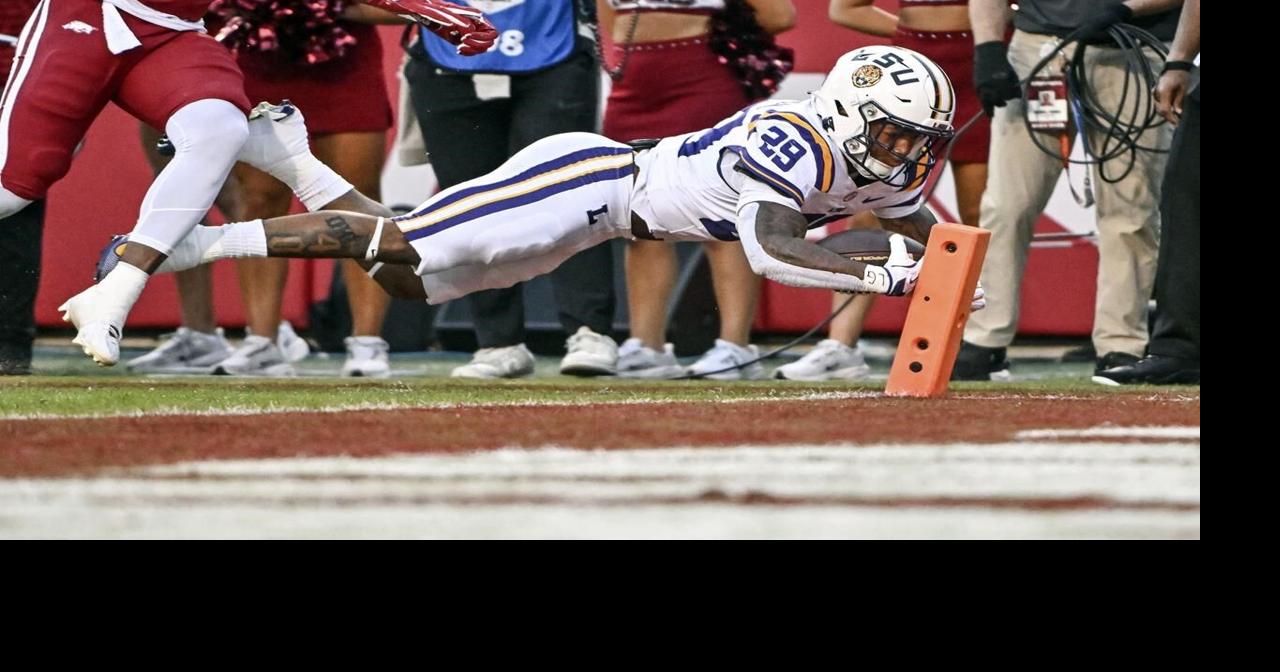 No. 8 LSU beats Arkansas 34-10 behind Durham's three touchdowns, Ramos ...