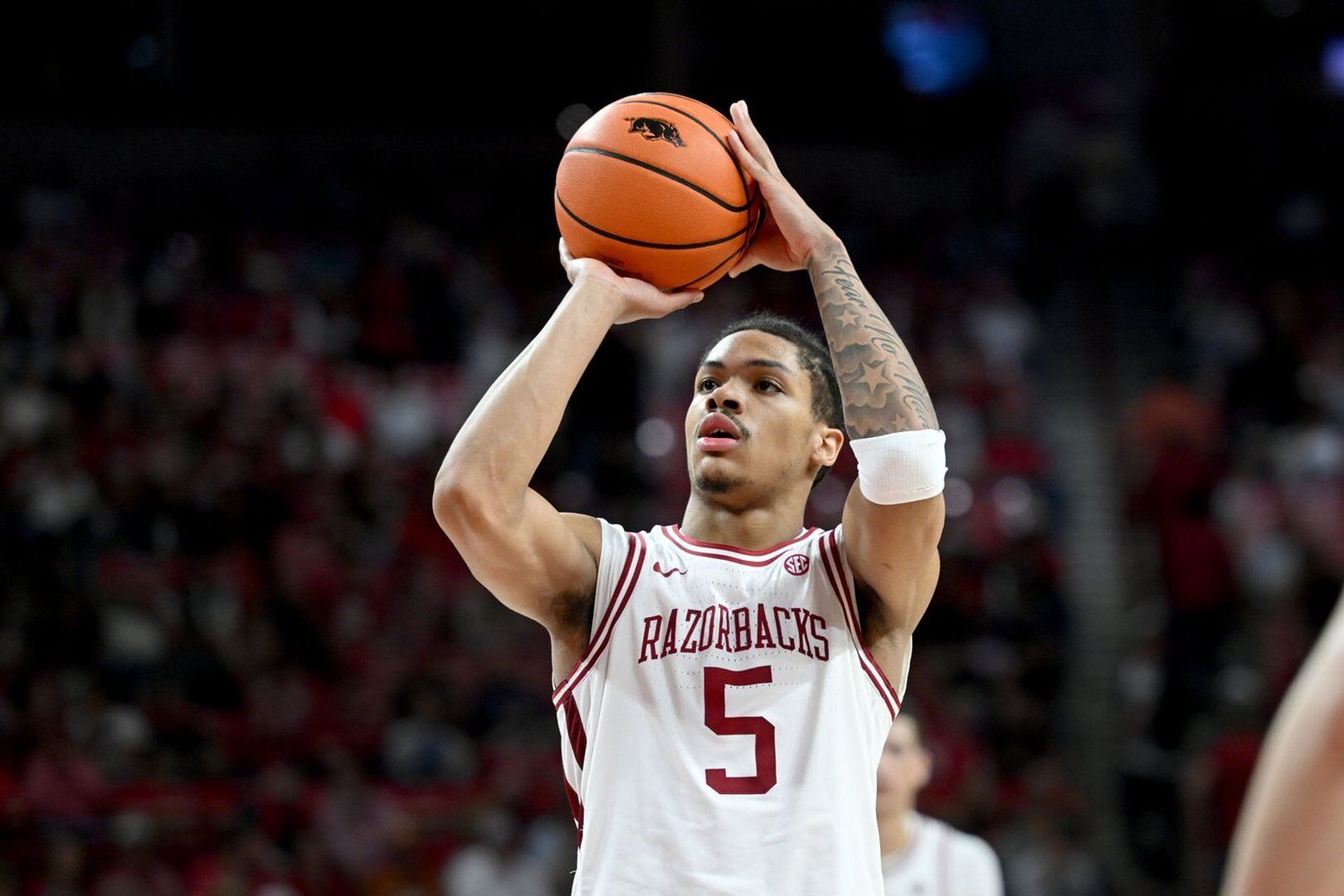 Arkansas guard Darius Acuff and Florida coach Todd Golden land top ...