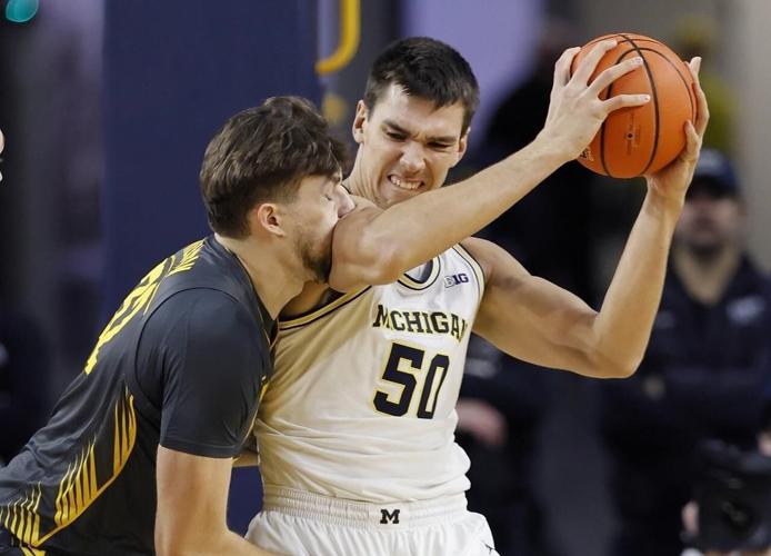 Gayle scores late to give Michigan 85-83 win over Iowa for Wolverines ...